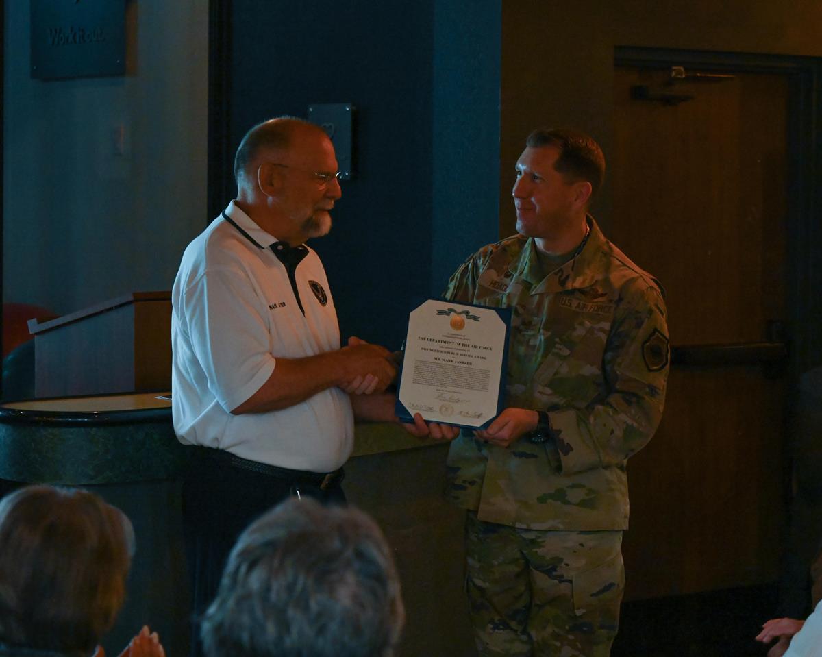 Air Force Civic Leader Mark Jantzer presented the Secretary of the Air ...